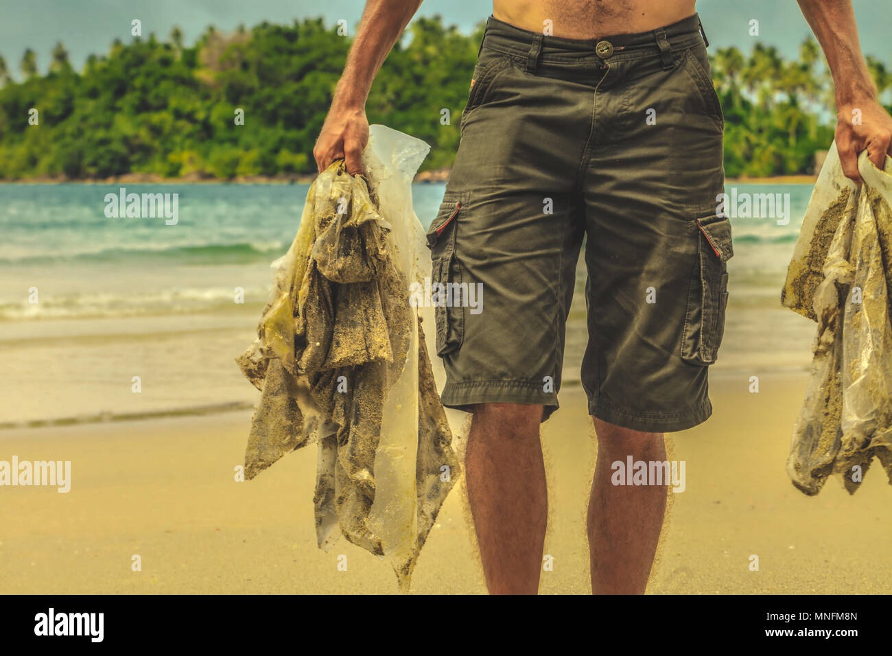 Volunteers clean beaches hi-res stock photography and images - Alamy