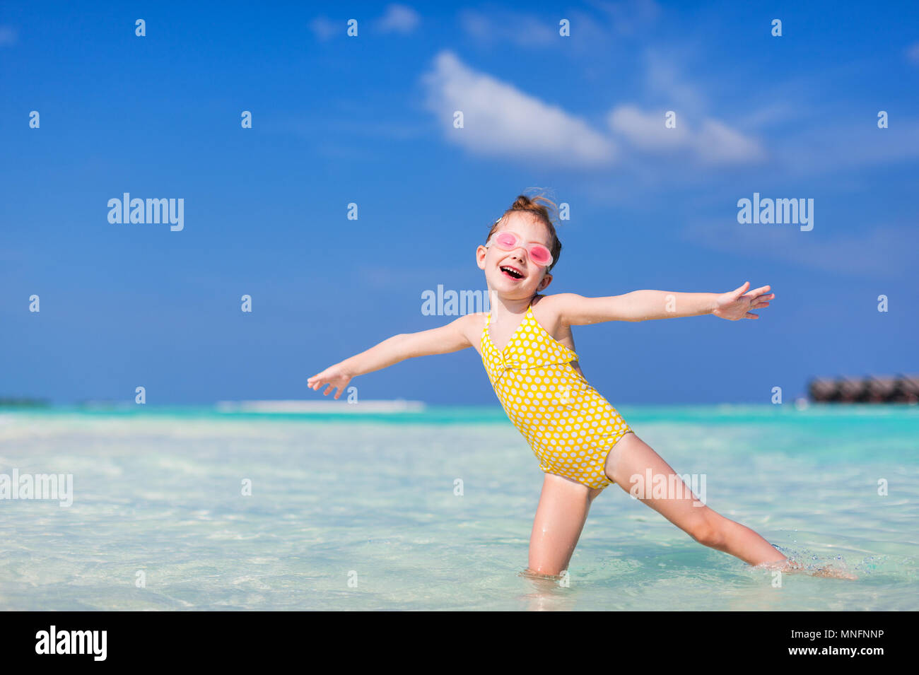 Girl Splashing In Sea Water High Resolution Stock Photography and ...
