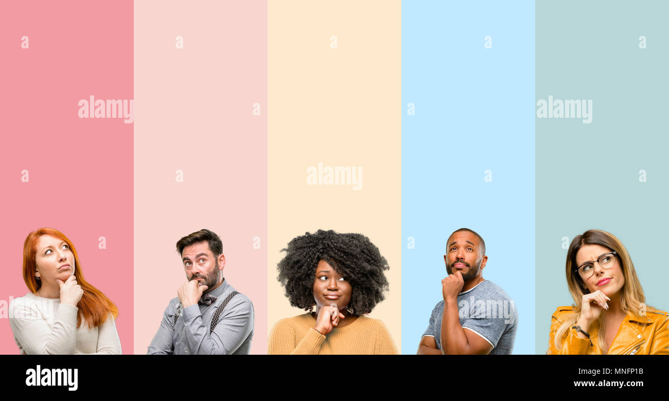 Cool group of people, woman and man thinking and looking up expressing ...
