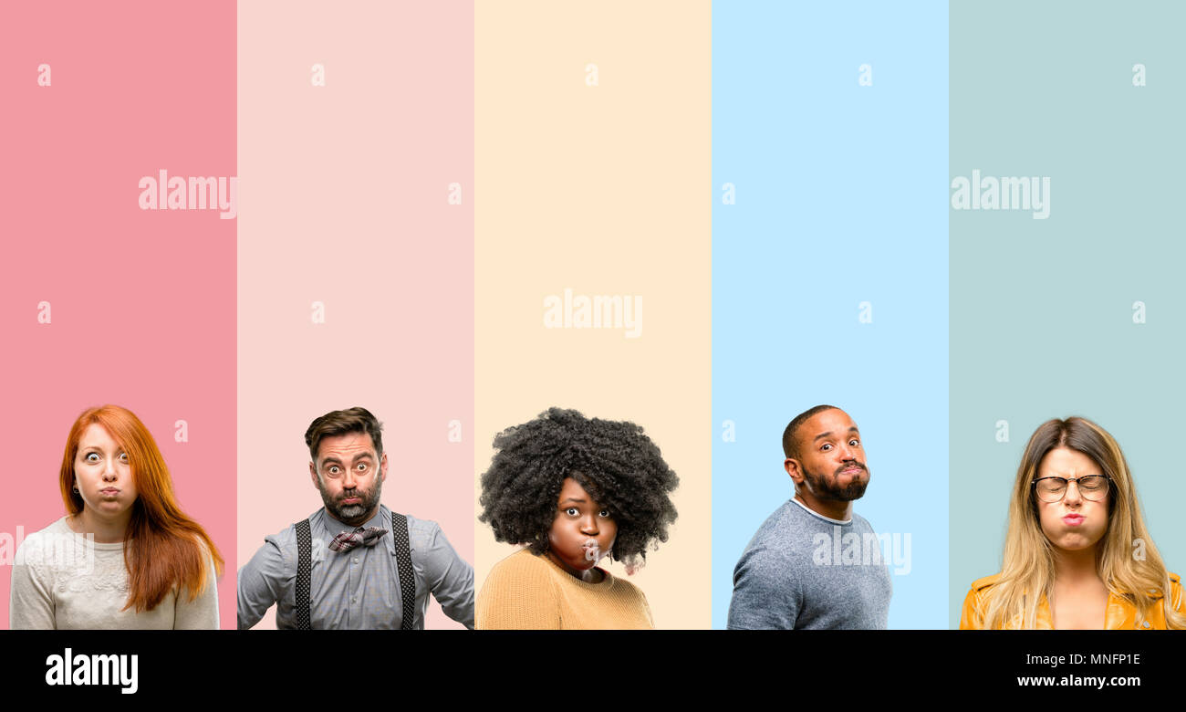 Cool group of people, woman and man puffing out cheeks, having fun ...