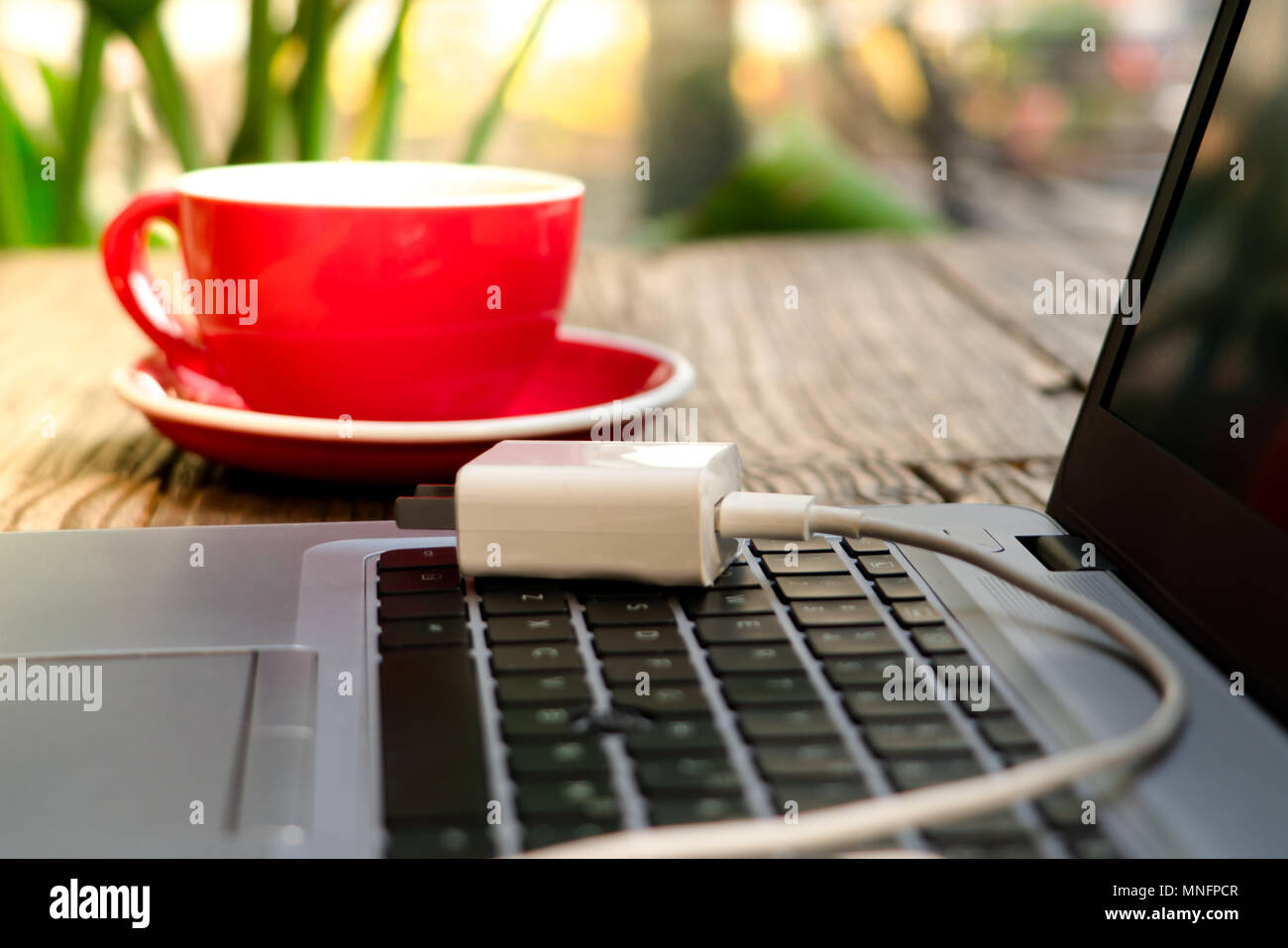 Laptop Computer Charging Plug High Resolution Stock Photography and ...