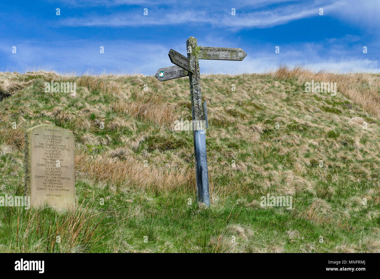 public footpath sign next to memorial stone of aircrew killed whilst ...