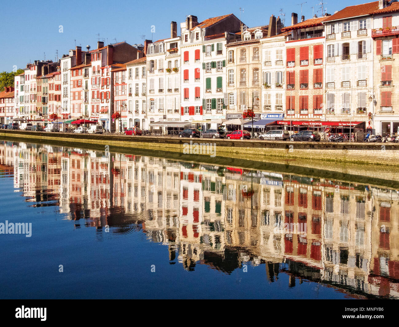 Reflections of the buildings of Quai Amiral Dubourdieu in the Nive ...