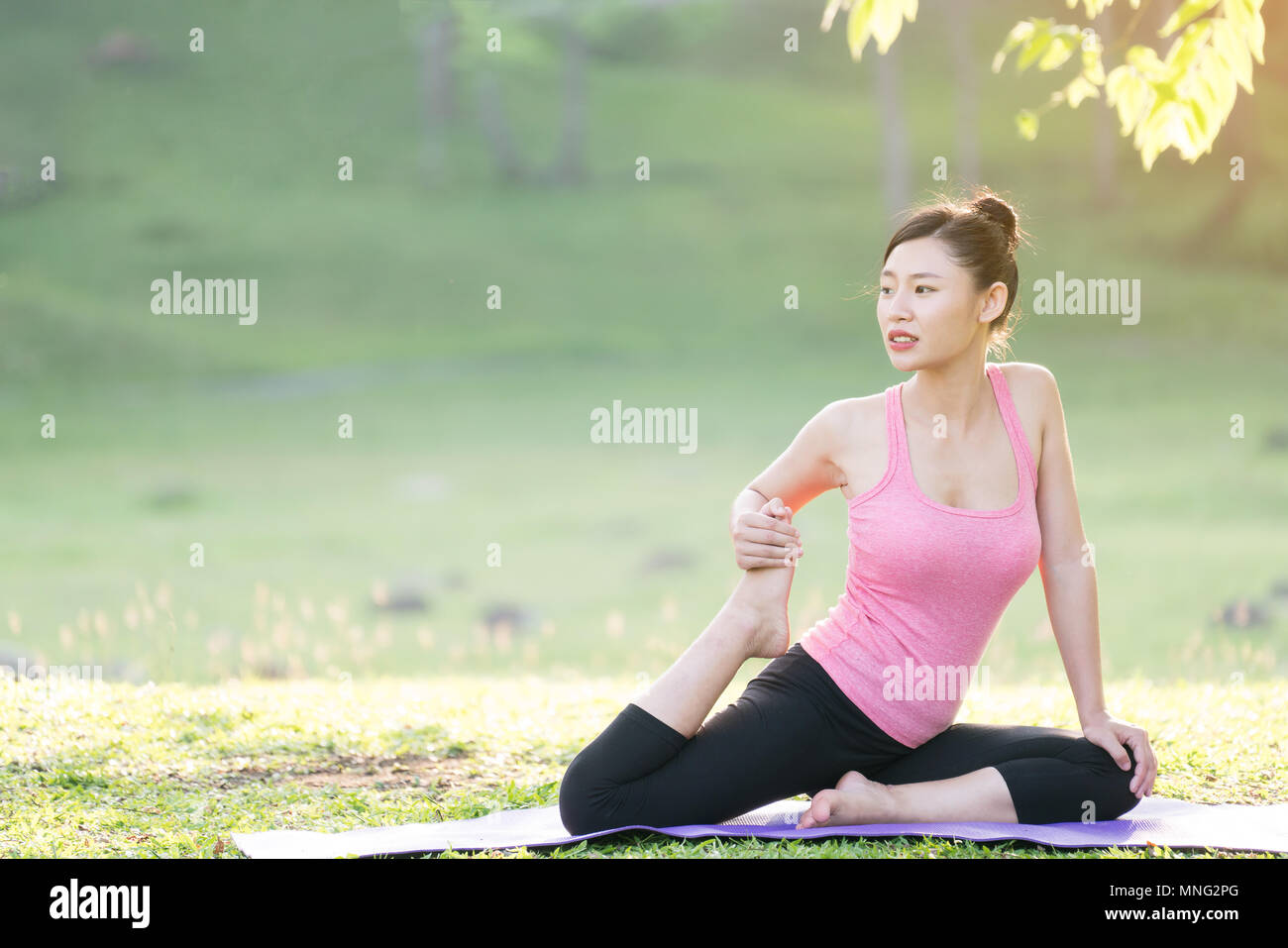 Beautiful asian woman practicing yoga hi-res stock photography and ...