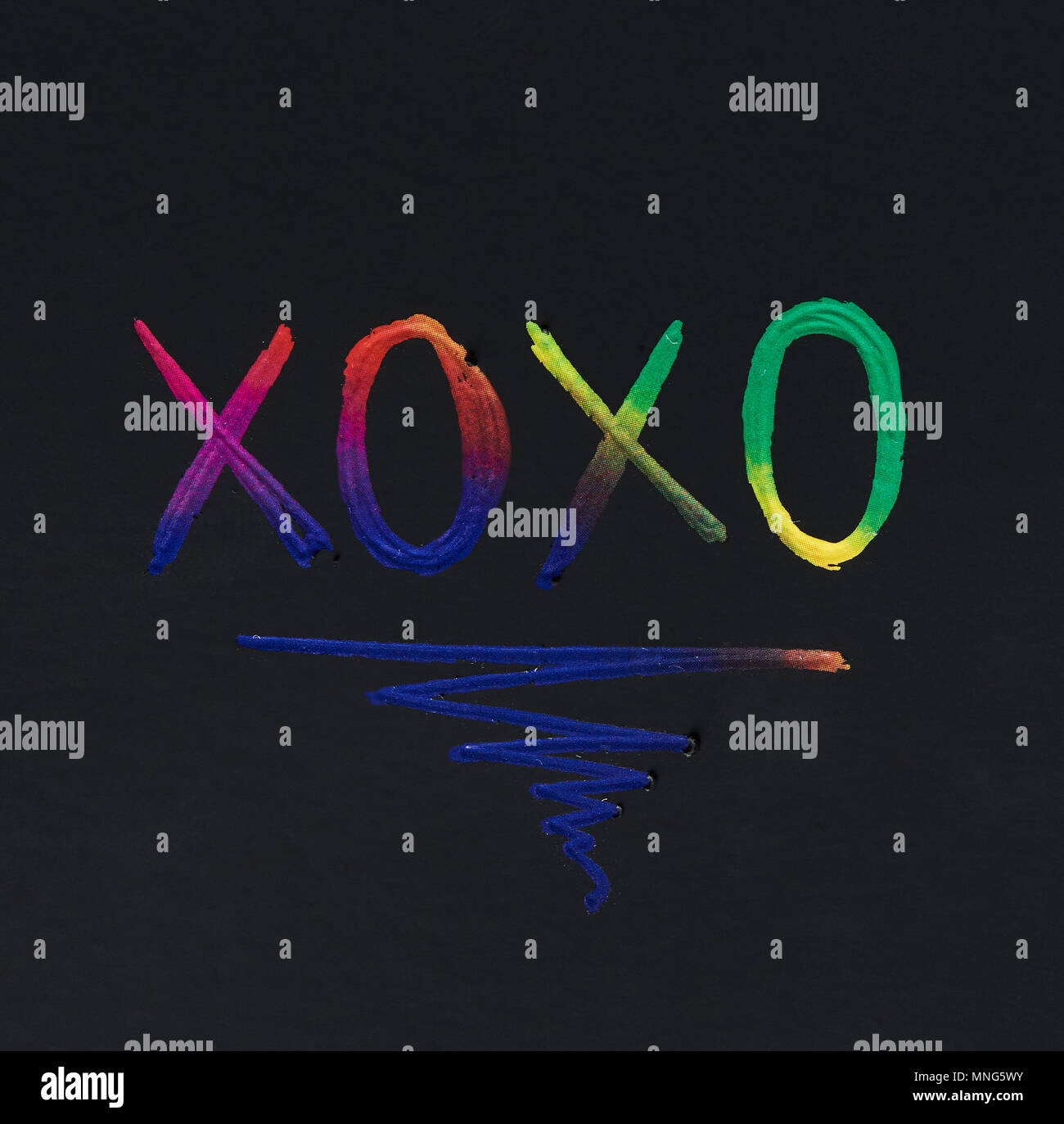 Hug and kisses sign on black paper note background Stock Photo - Alamy