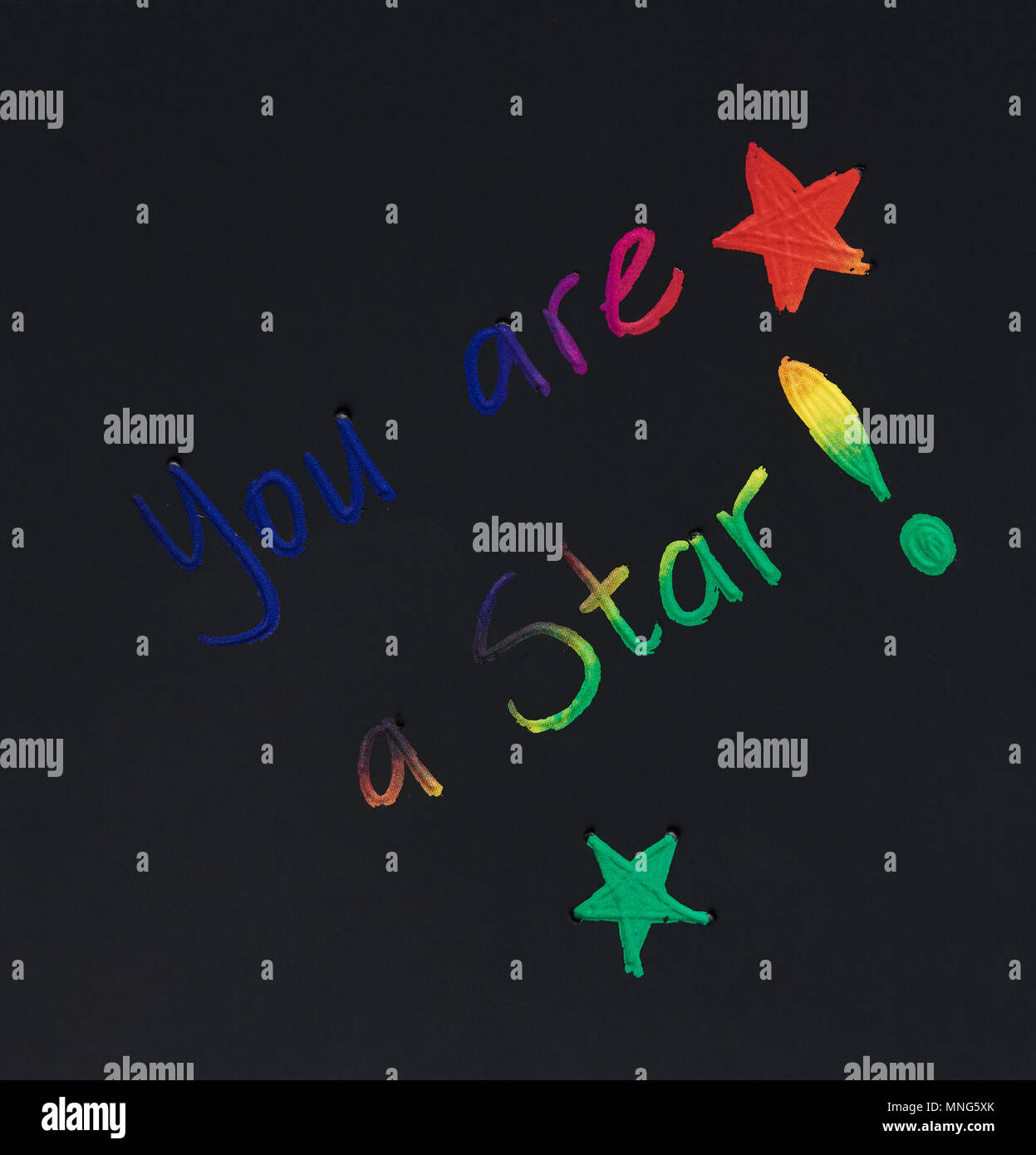 You are star message on black paper background Stock Photo - Alamy