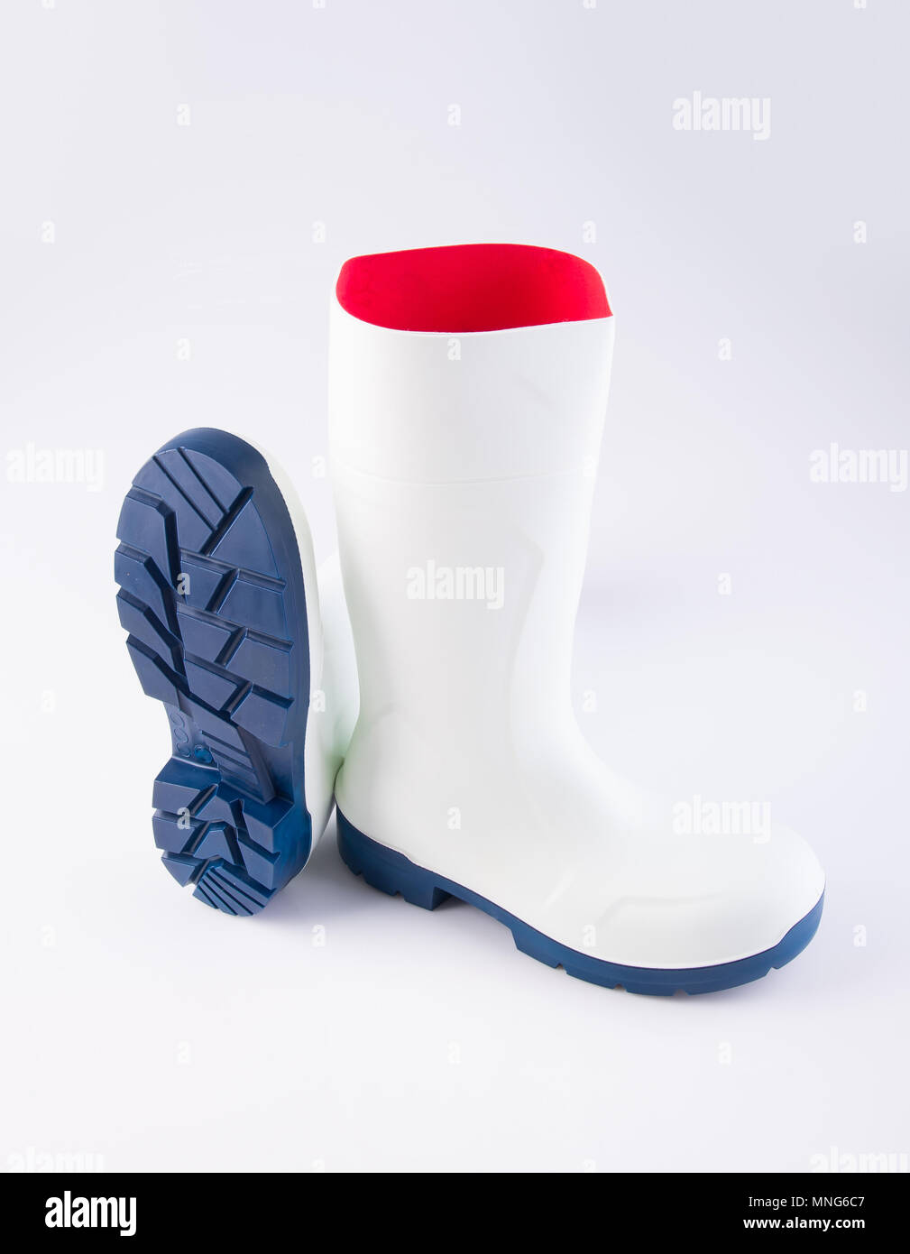 shoe or white color rubber boots on a background Stock Photo - Alamy