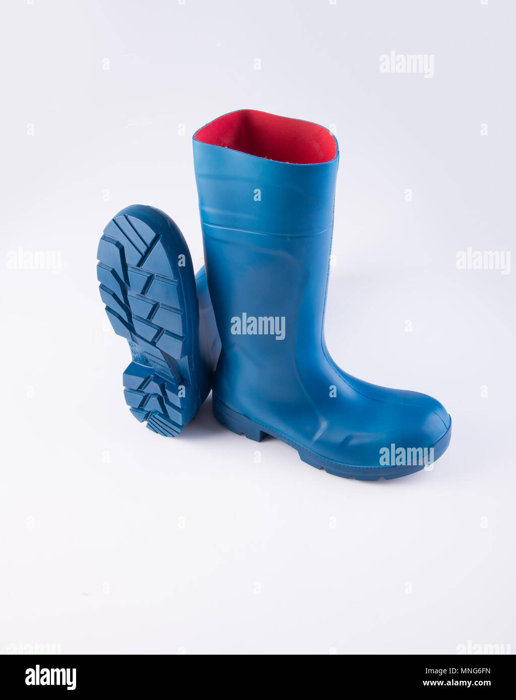 shoe or blue color rubber boots on a background Stock Photo - Alamy