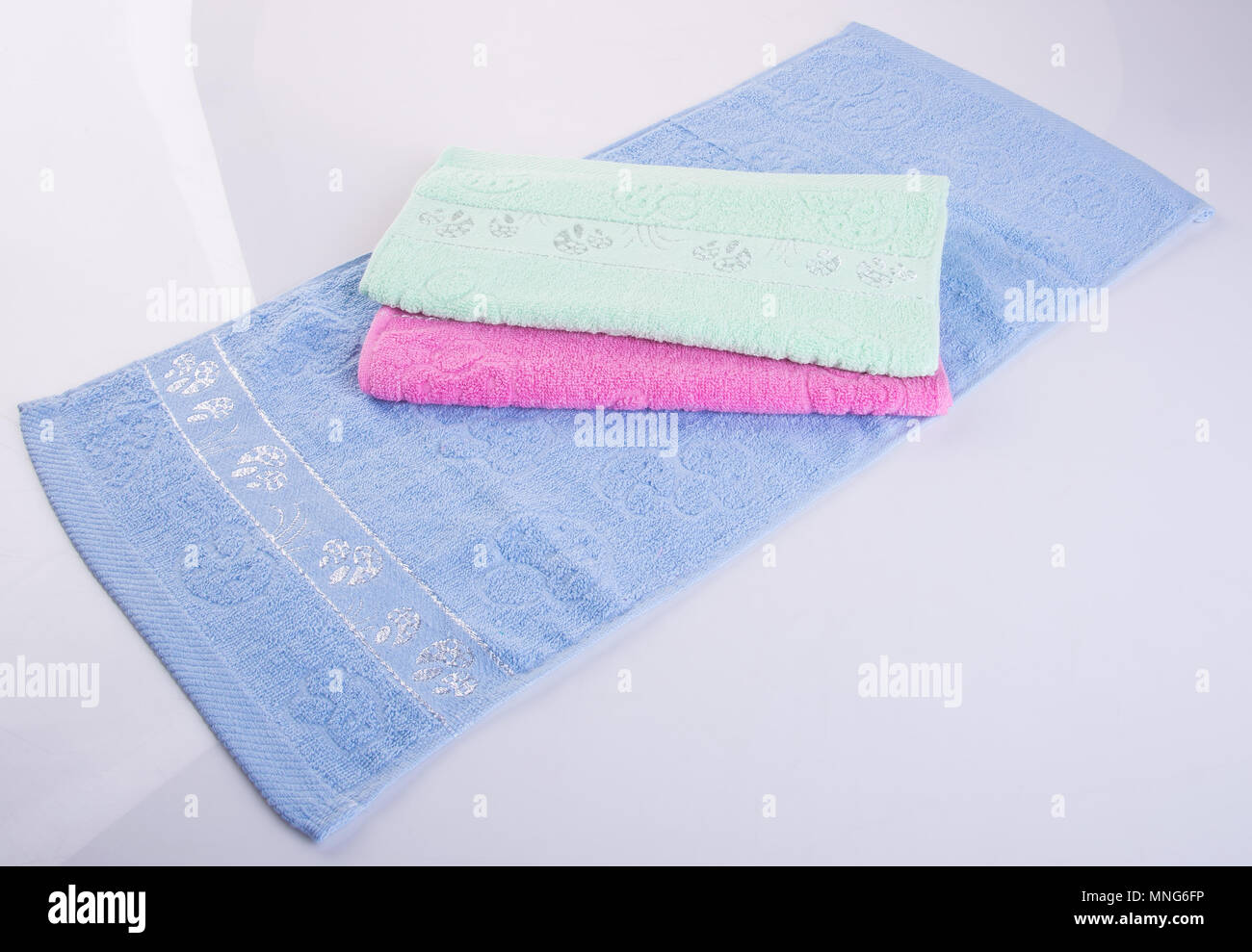Kitchen towel on a white background Stock Photo - Alamy