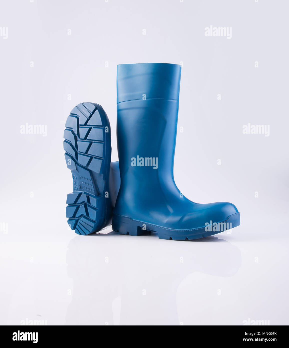 shoe or blue color rubber boots on a background Stock Photo - Alamy