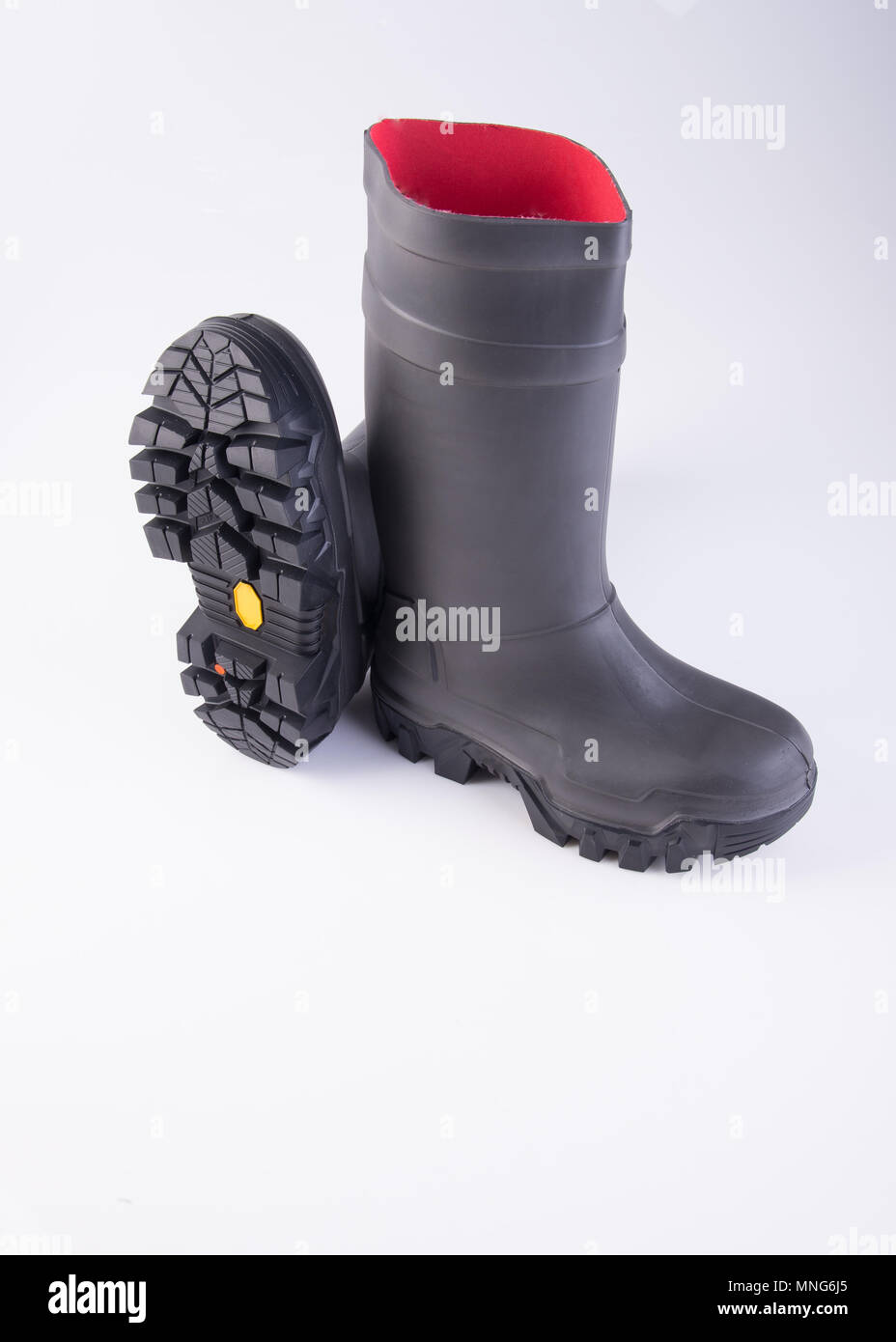 shoe or black color rubber boots on a background Stock Photo - Alamy