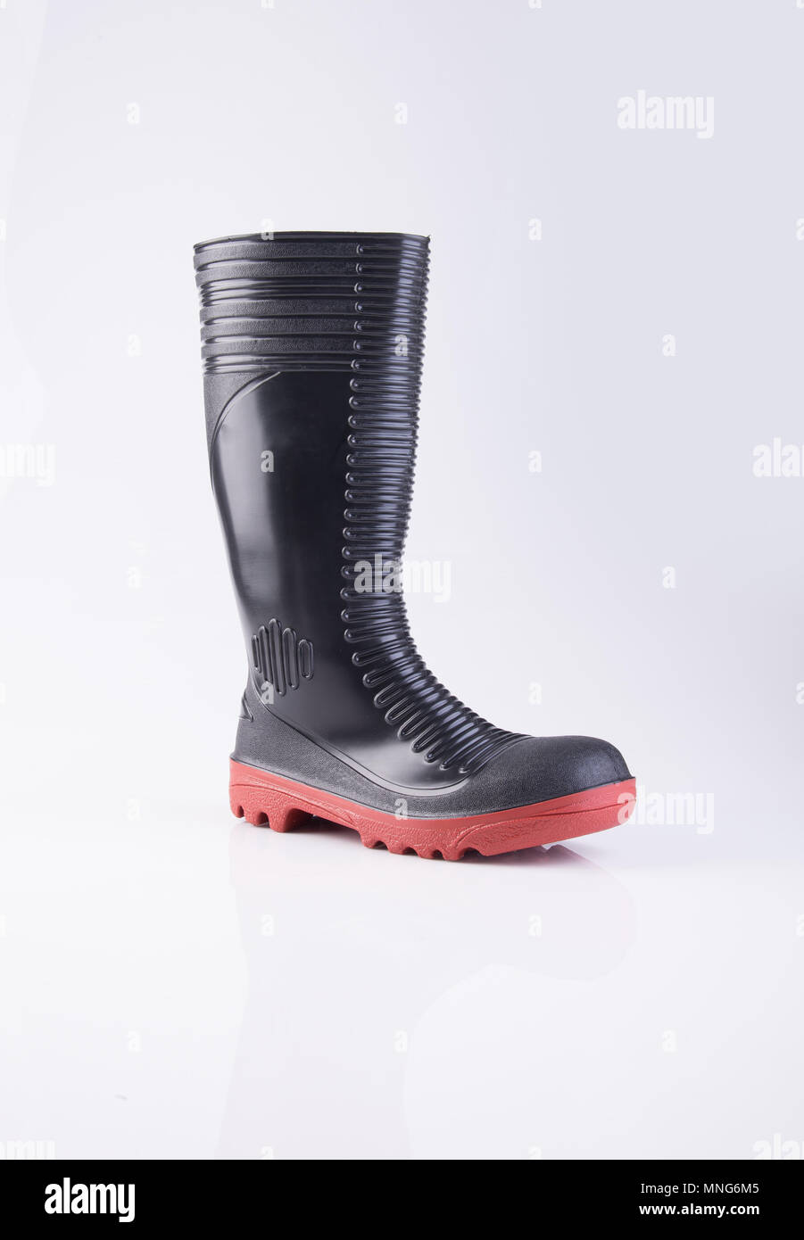 shoe or black color rubber boots on a background Stock Photo - Alamy