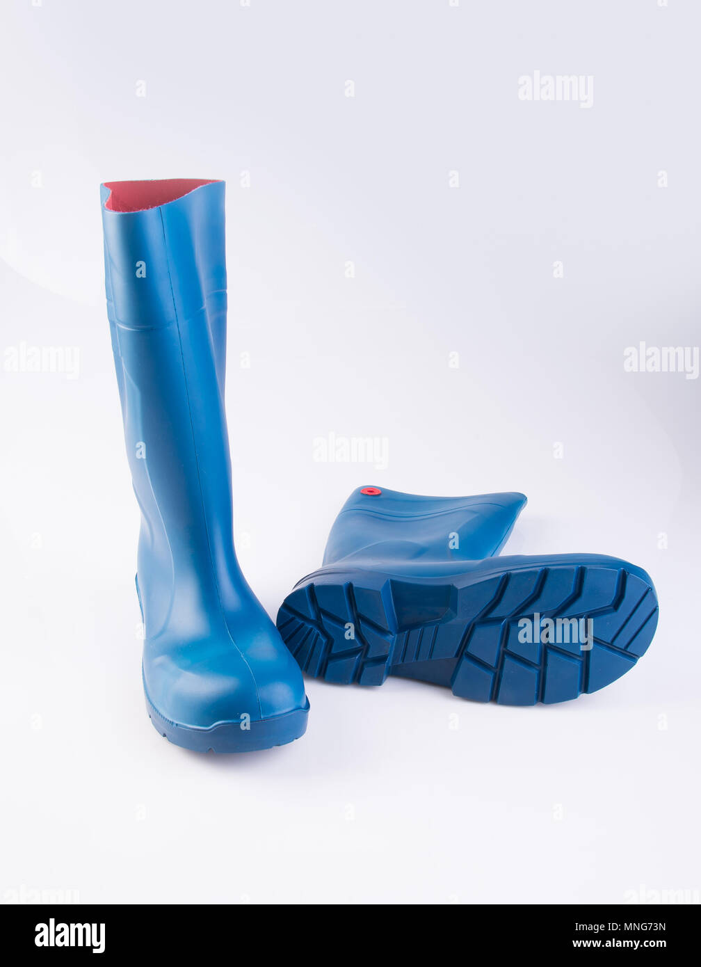 shoe or blue color rubber boots on a background Stock Photo - Alamy