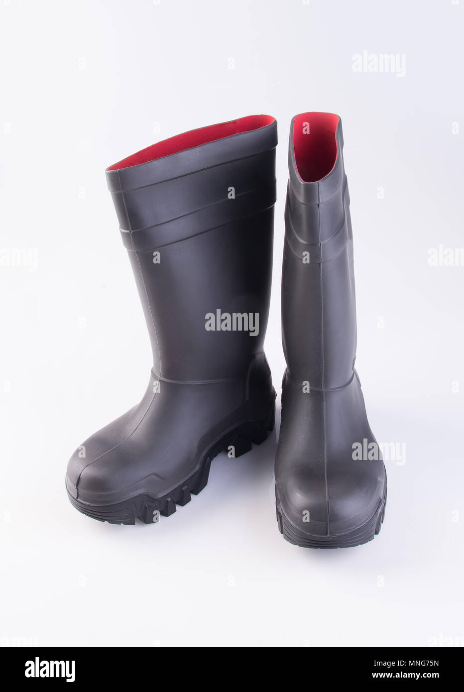 shoe or black color rubber boots on a background Stock Photo - Alamy