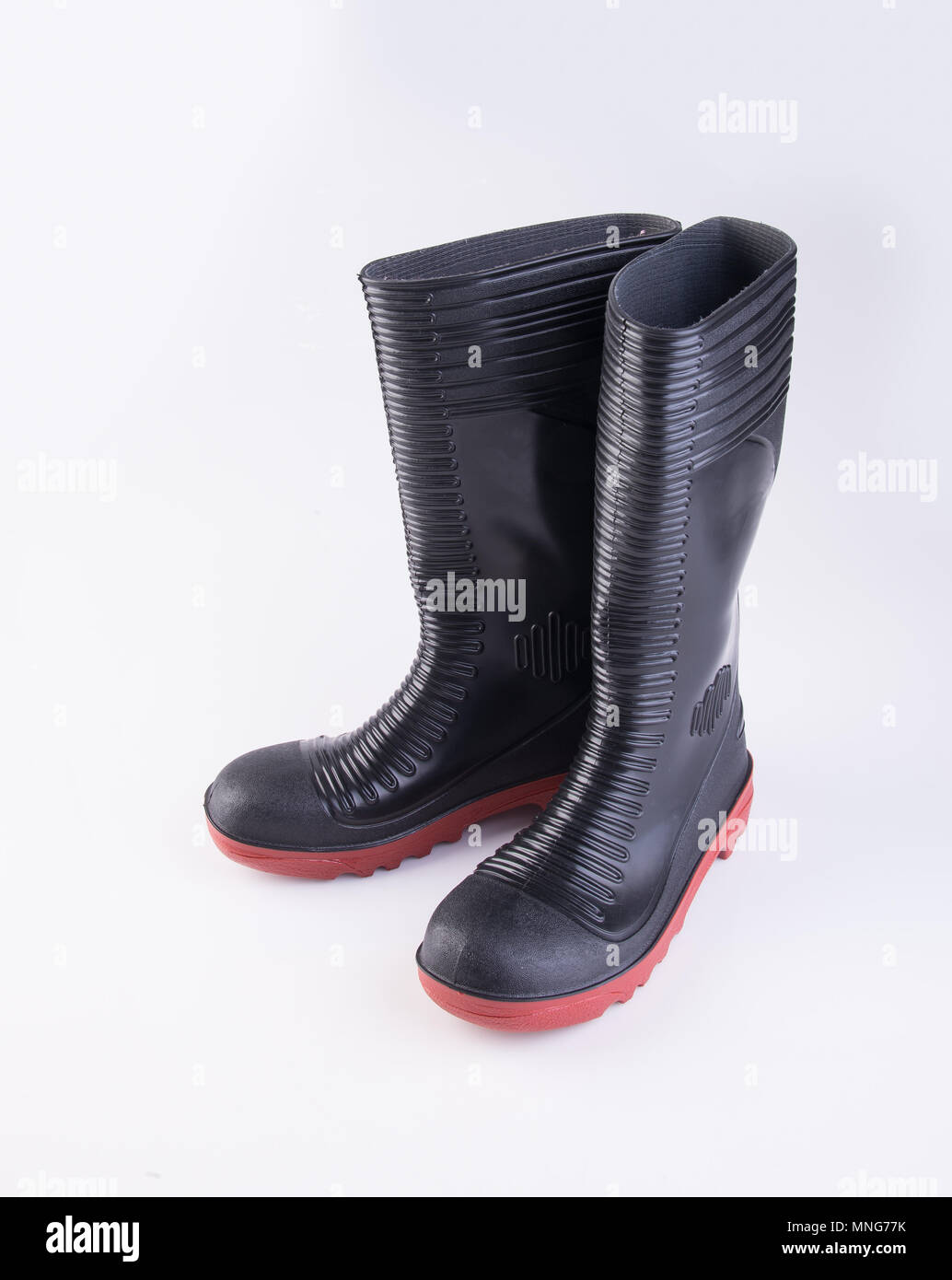 shoe or black color rubber boots on a background Stock Photo - Alamy