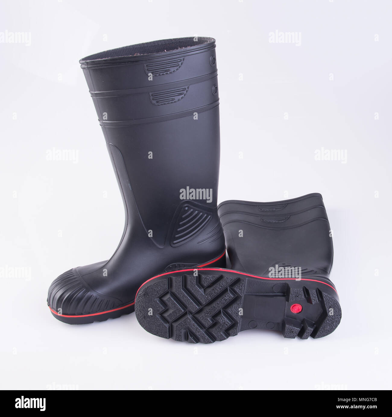 shoe or black color rubber boots on a background Stock Photo - Alamy