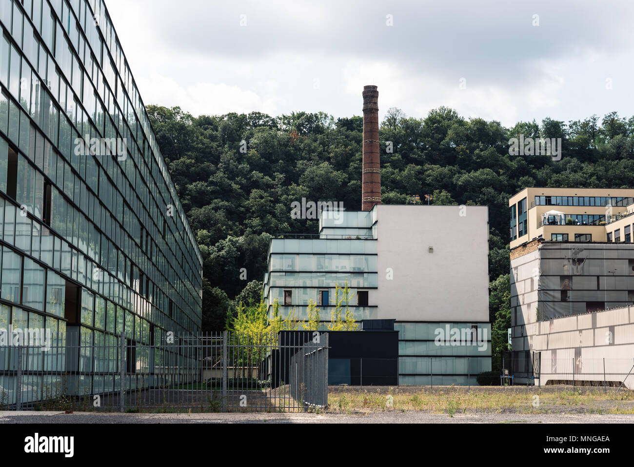 Industrial buildings in Prague against mountain and sky Stock Photo - Alamy
