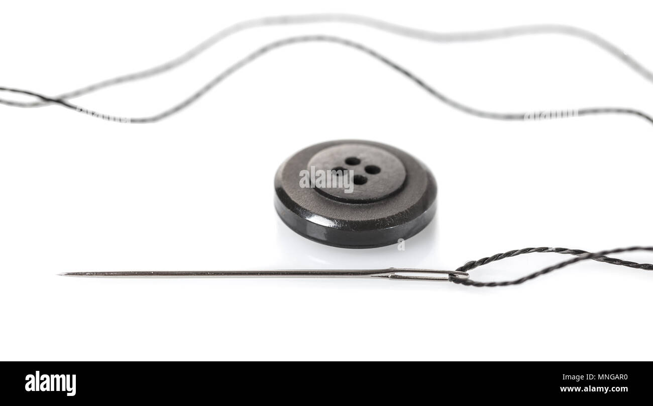 needle with thread and button on white isolated background Stock Photo ...