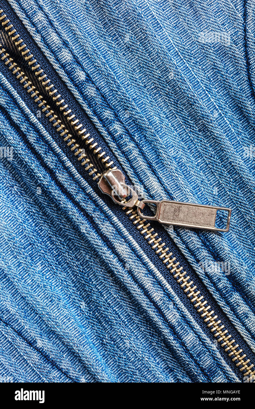 abstract background from a denim and a zipper texture Stock Photo - Alamy