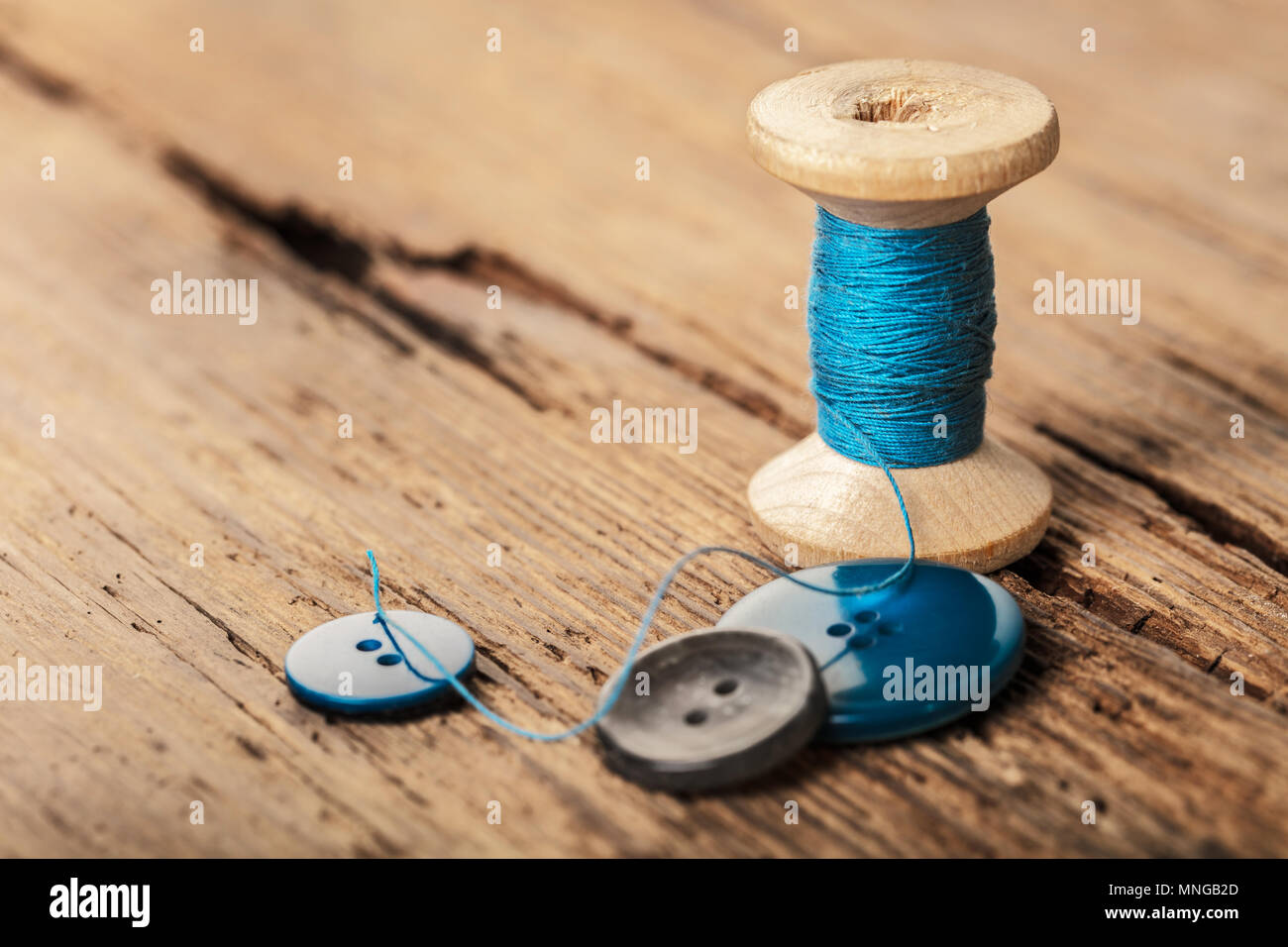 Spool of threads hi-res stock photography and images - Alamy