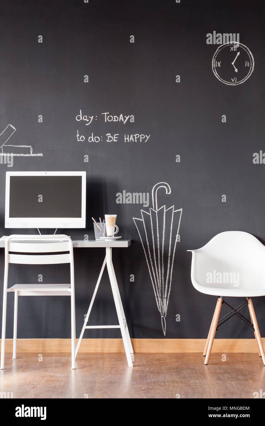 Shot of a modern room with a blackboard wall Stock Photo - Alamy