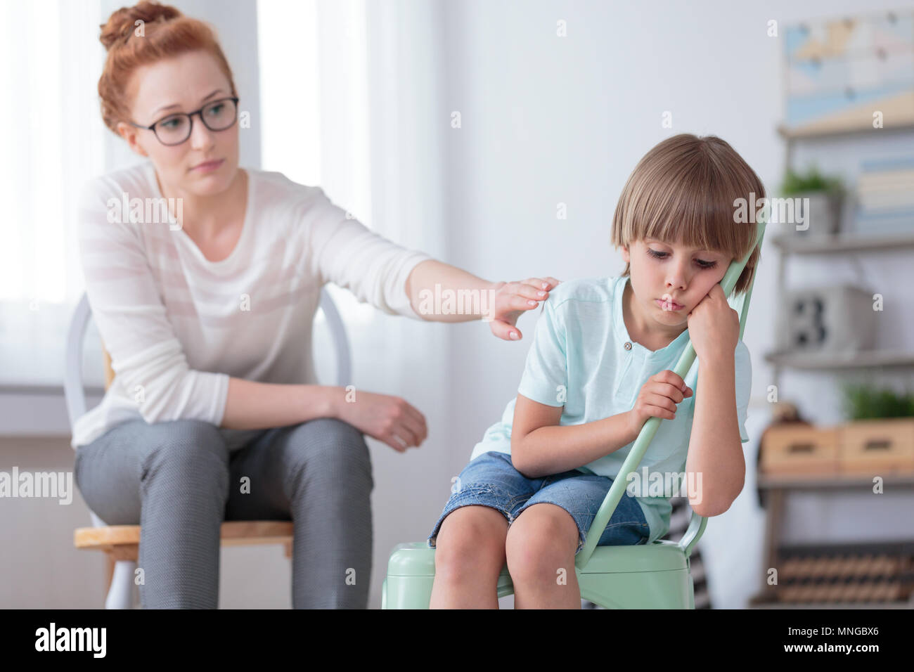 Autistic child with teacher hi-res stock photography and images - Alamy