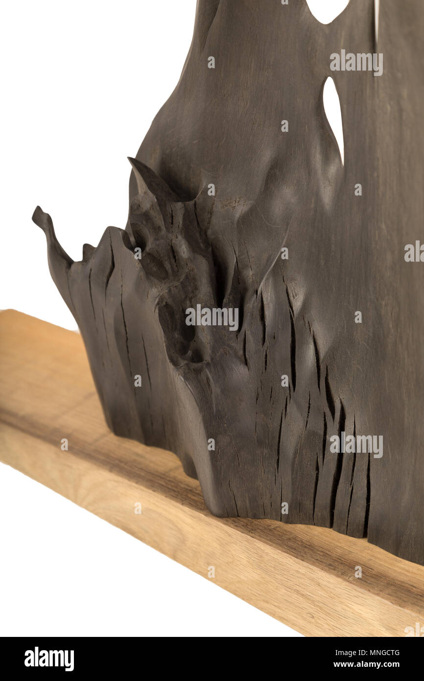 A product made from the roots of an old oak tree on a white background ...