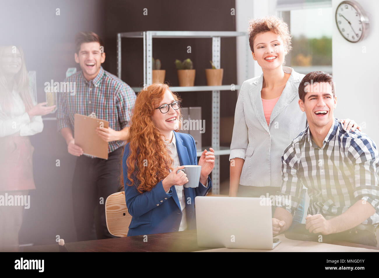 Happy business team and positive work environment Stock Photo - Alamy
