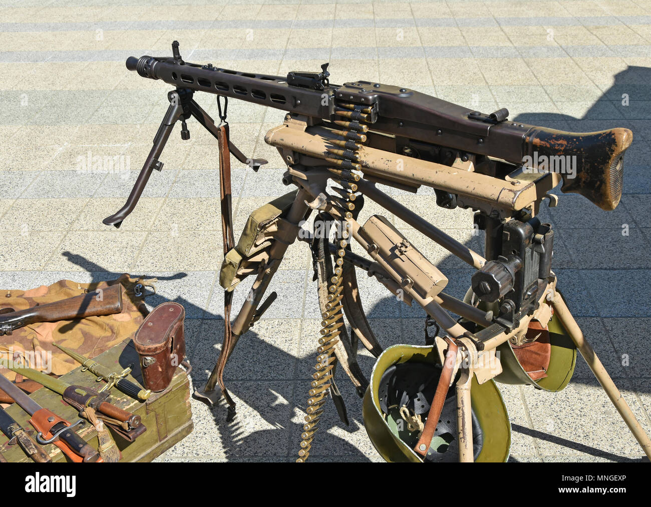 Old machine gun and other weapons Stock Photo - Alamy