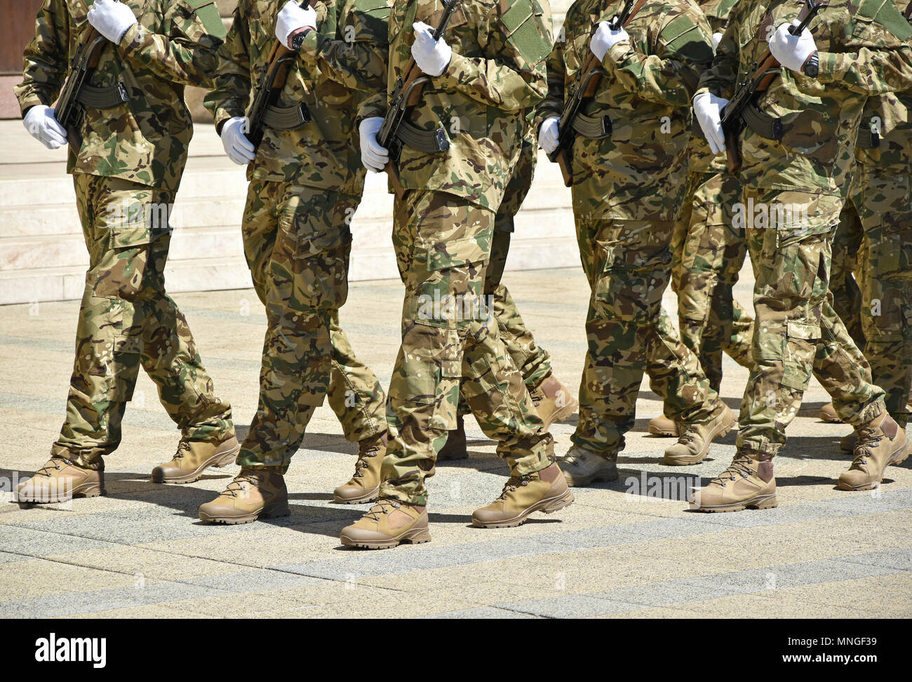 Soldiers are marching at the military parade Stock Photo - Alamy
