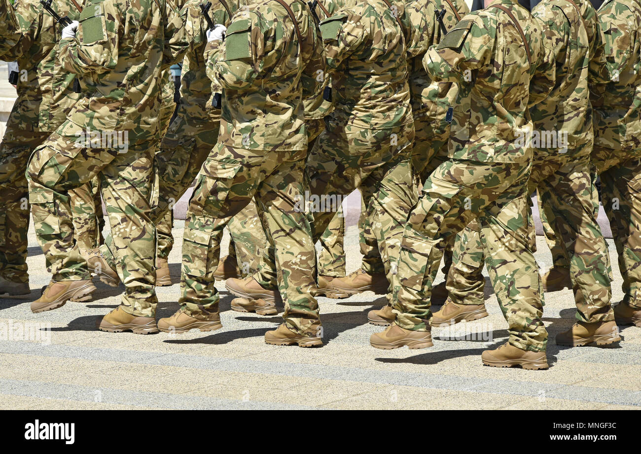 Soldiers are marching at the military parade Stock Photo - Alamy