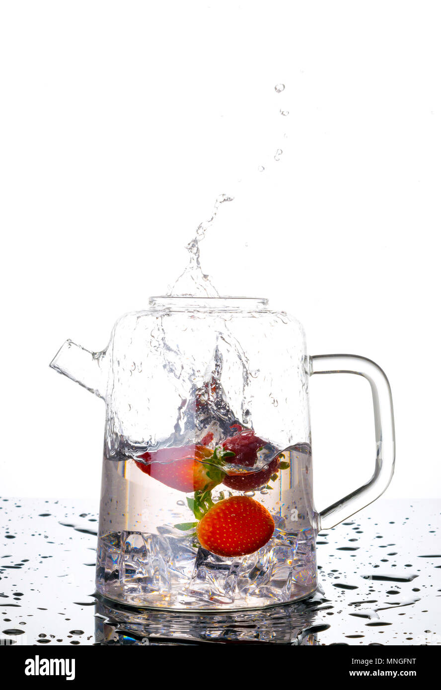 Strawberries, Water, Glass, High speed strobe, movement Stock Photo - Alamy