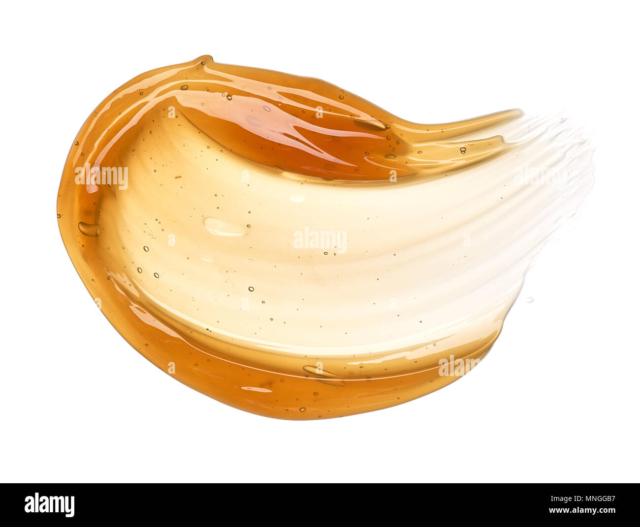 Transparent yellow smear of face cream or golden honey isolated on ...