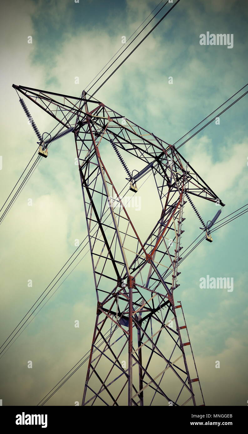 very large high voltage pylon with electric cables Stock Photo - Alamy