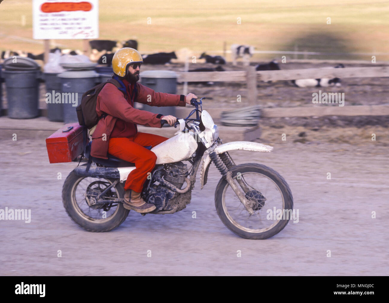 RAJNEESHPURAM, OREGON, USA - Rajneeshee on motorbike, a follower of ...
