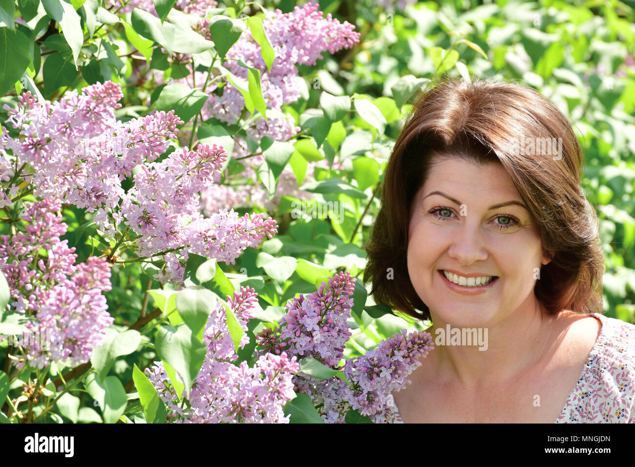 Mature woman spring hi-res stock photography and images - Alamy