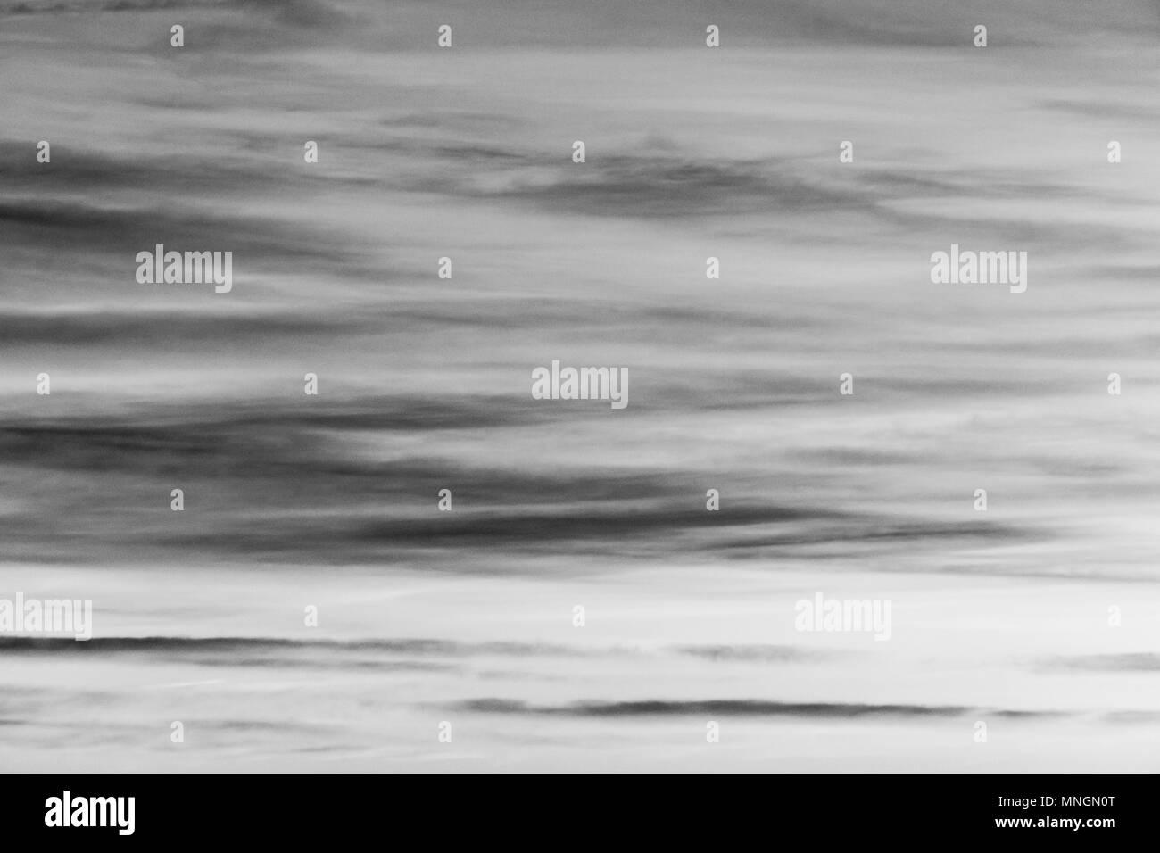 Clouds and jet vapor trails creating beautiful texture in the sk Stock ...