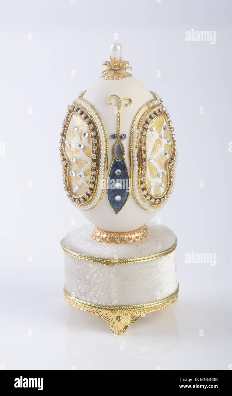 Decorative ceramic easter egg for jewellery or Faberge egg on white ...