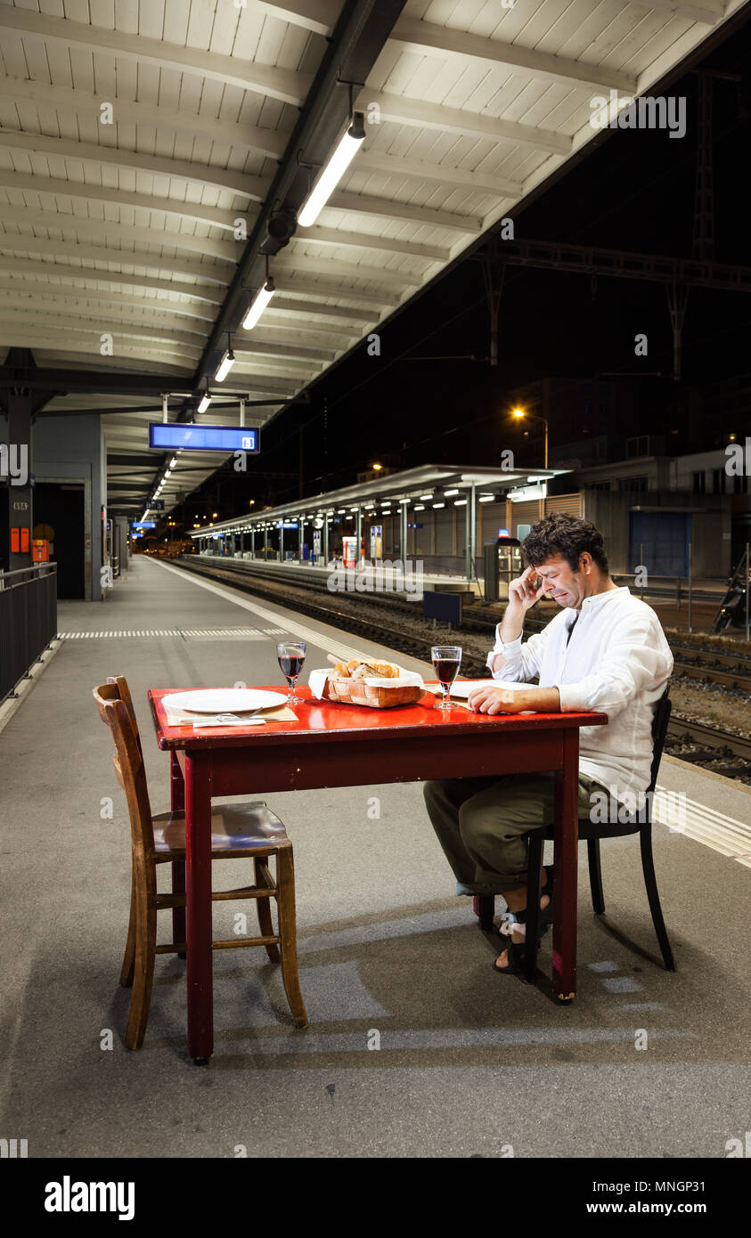 portrait of a man at the train station Stock Photo - Alamy