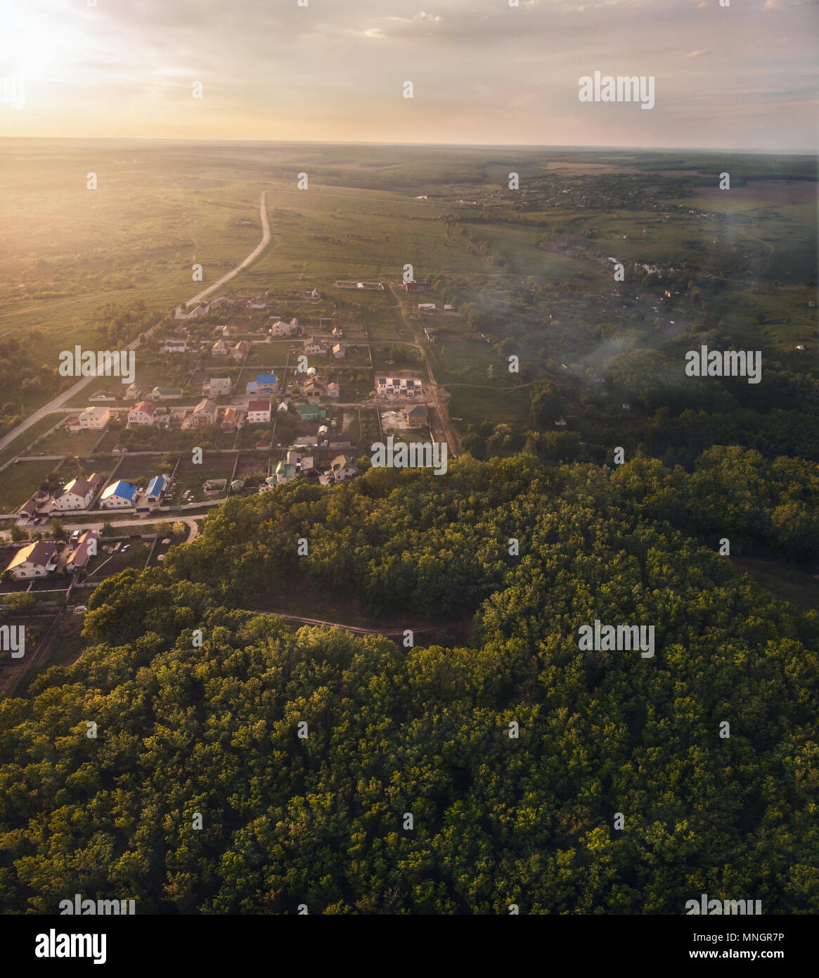 A bird's eye view of the sunset in the forest-steppe zone Stock Photo ...