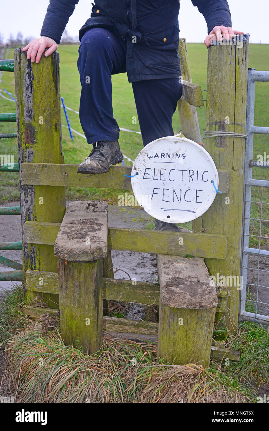 Climb over fence hi-res stock photography and images - Alamy