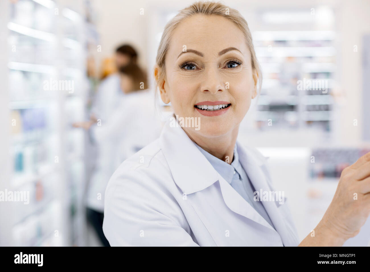 Professional pharmacist working customer hi-res stock photography and ...
