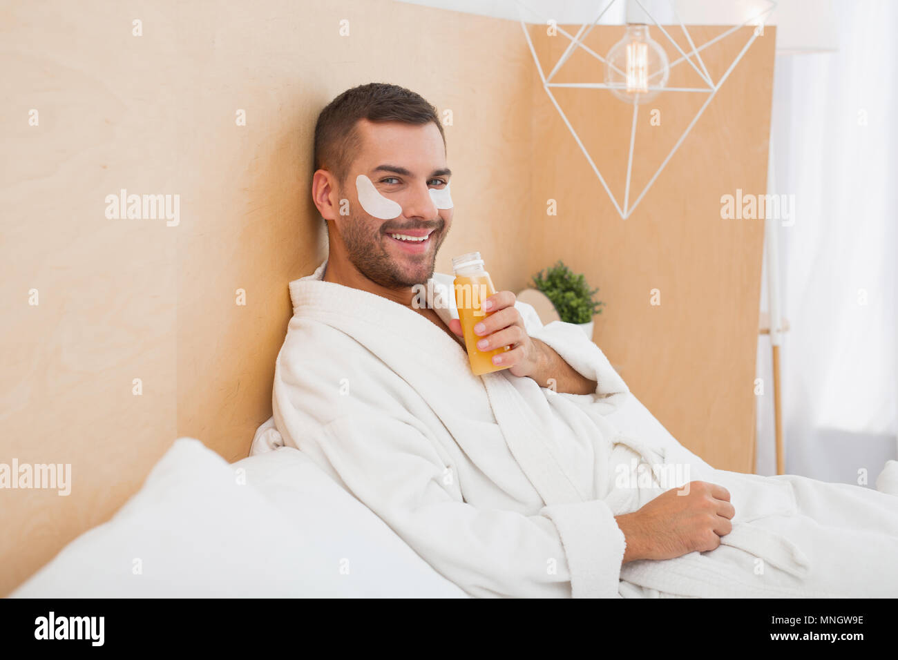 Positive happy man relaxing at home Stock Photo - Alamy
