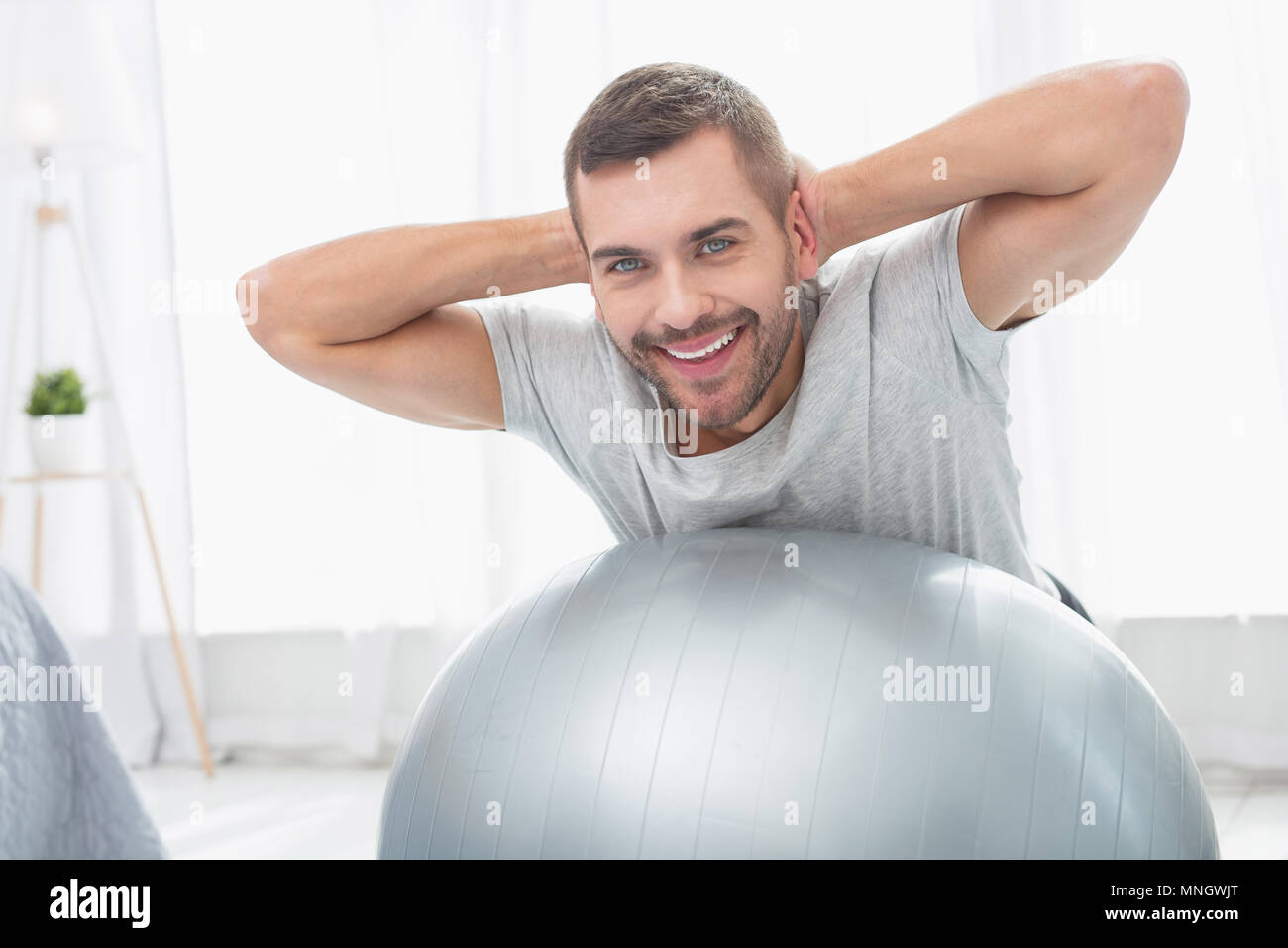 Cheerful happy man looking at you Stock Photo - Alamy