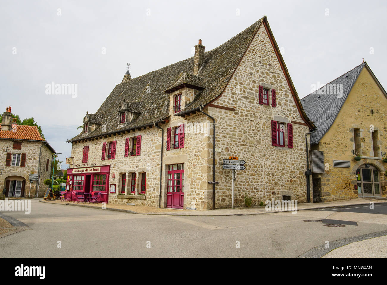 Auberge in medieval village Marcoles, Cantal department in south ...