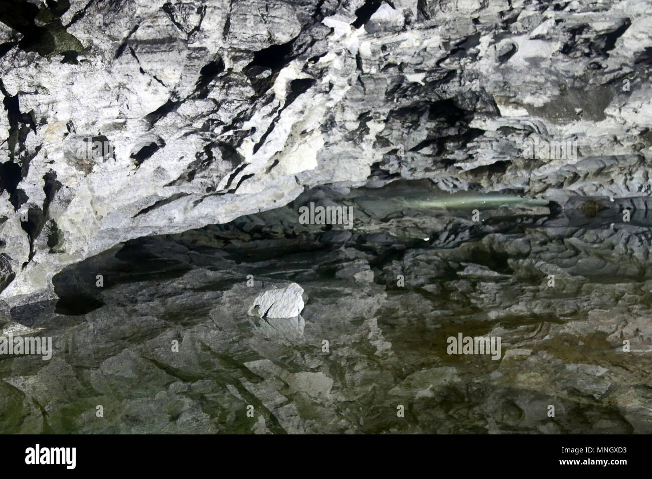 river inside karst caves, slow current of clear water, cave river ...