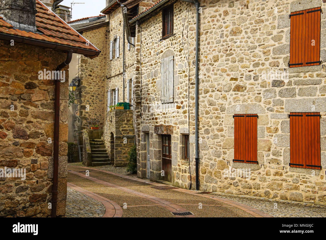 Street in the medieval village Marcoles, Cantal department in south ...