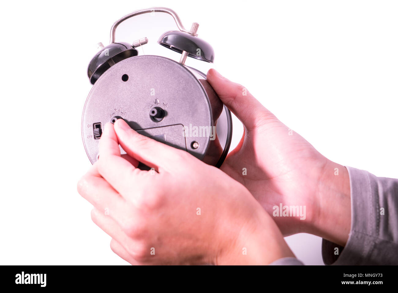 Woman setting alarm clock hi-res stock photography and images - Alamy