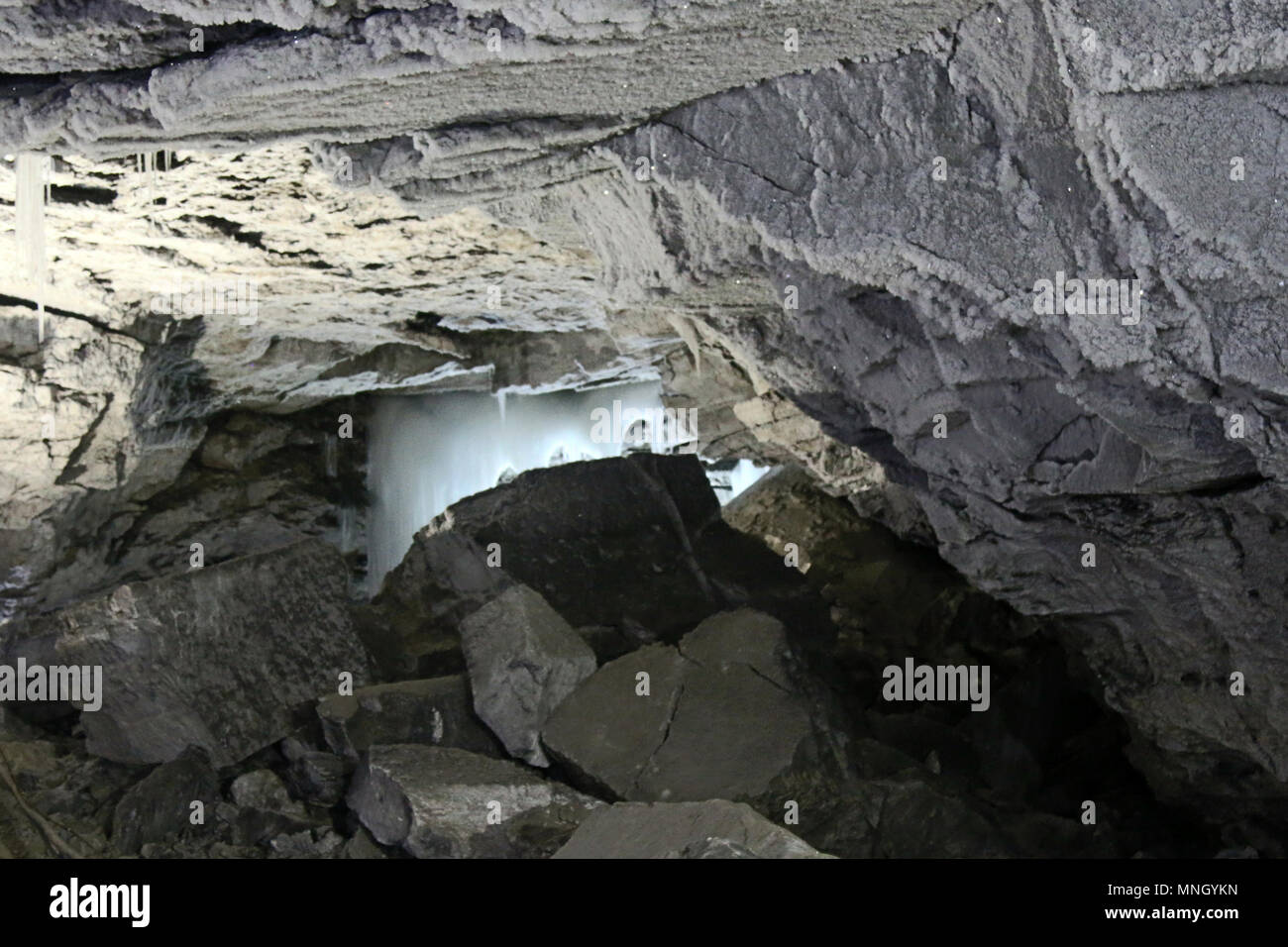 Ice stalactites, stalagmites and columns in cave, ice bodies, ice ...