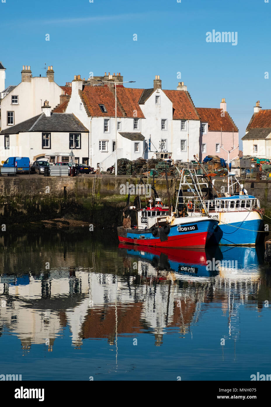 Fishing harbour with many fishing boats at Pittenweem in East Neuk of ...
